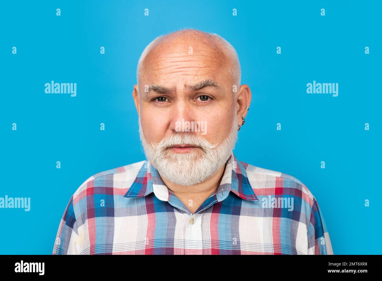 Grandfather pensioner, retiree concept. Closeup emotional portrait of an old mature senior man ...