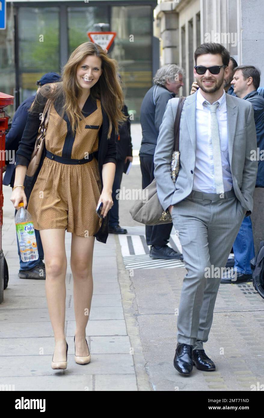 English comedian, actress and TV presenter Olivia Lee is all smiles as she poses for photos ...