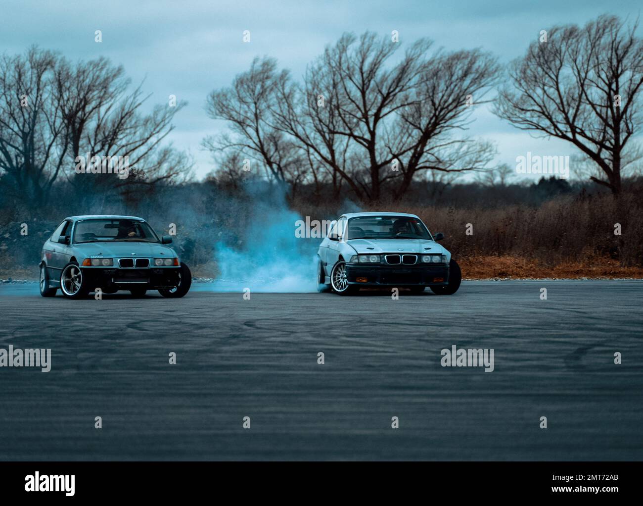 Two cars drifting at Great Lakes Dragaway on a gloomy day Stock Photo ...