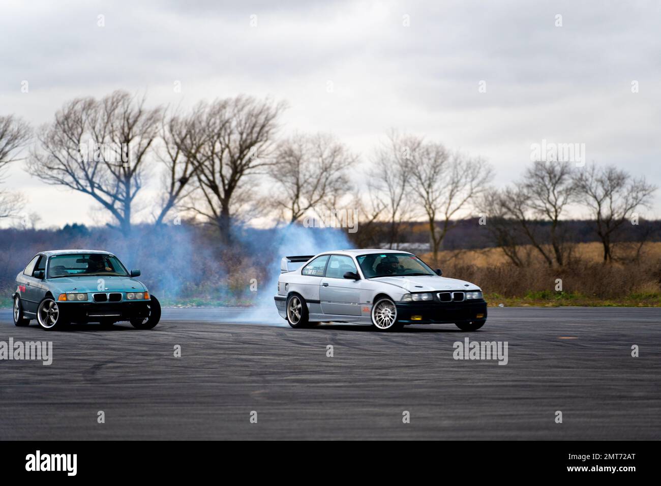Two cars drifting at Great Lakes Dragaway on a gloomy day Stock Photo ...