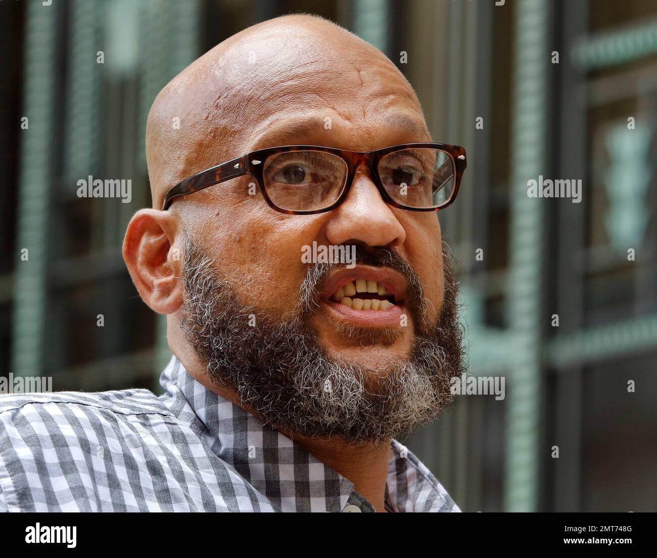 Andre Jones, of New York, speaks outside the Suffolk County Courthouse ...