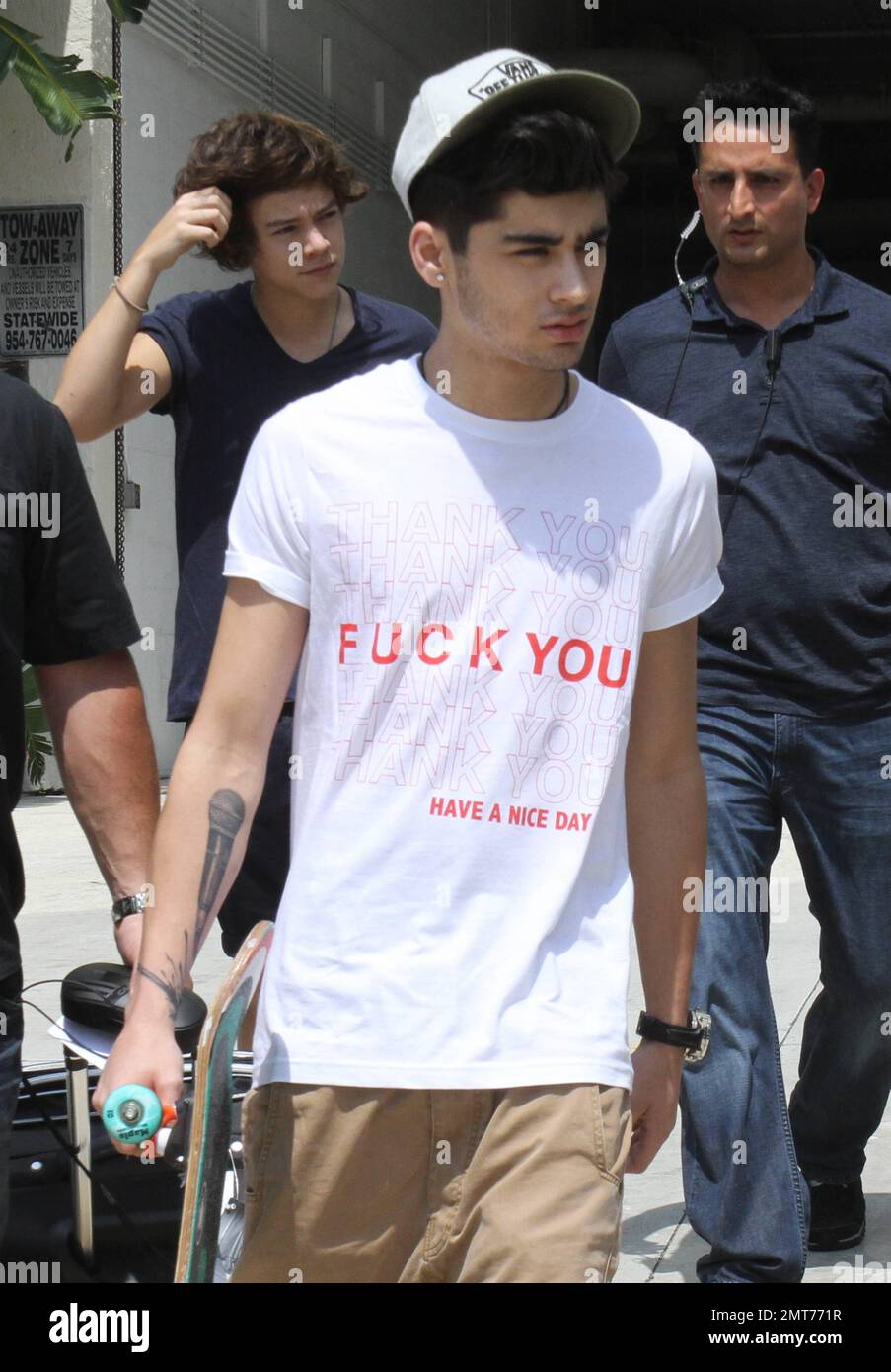 Harry styles one direction leaving hi-res stock photography and images ...