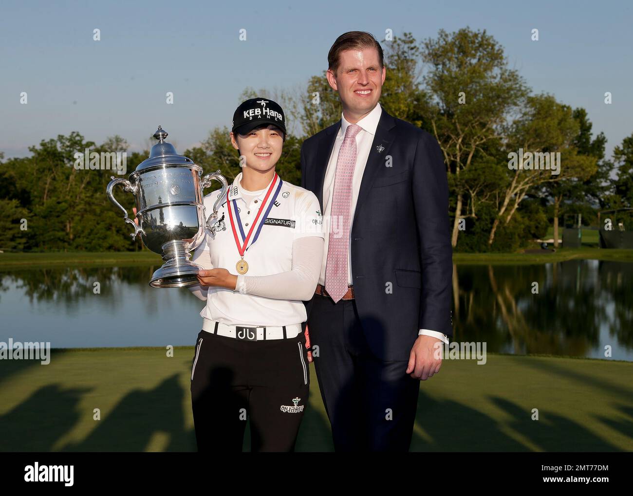 South Korea's Sung Hyun Park poses for a photo with Eric Trump as she ...