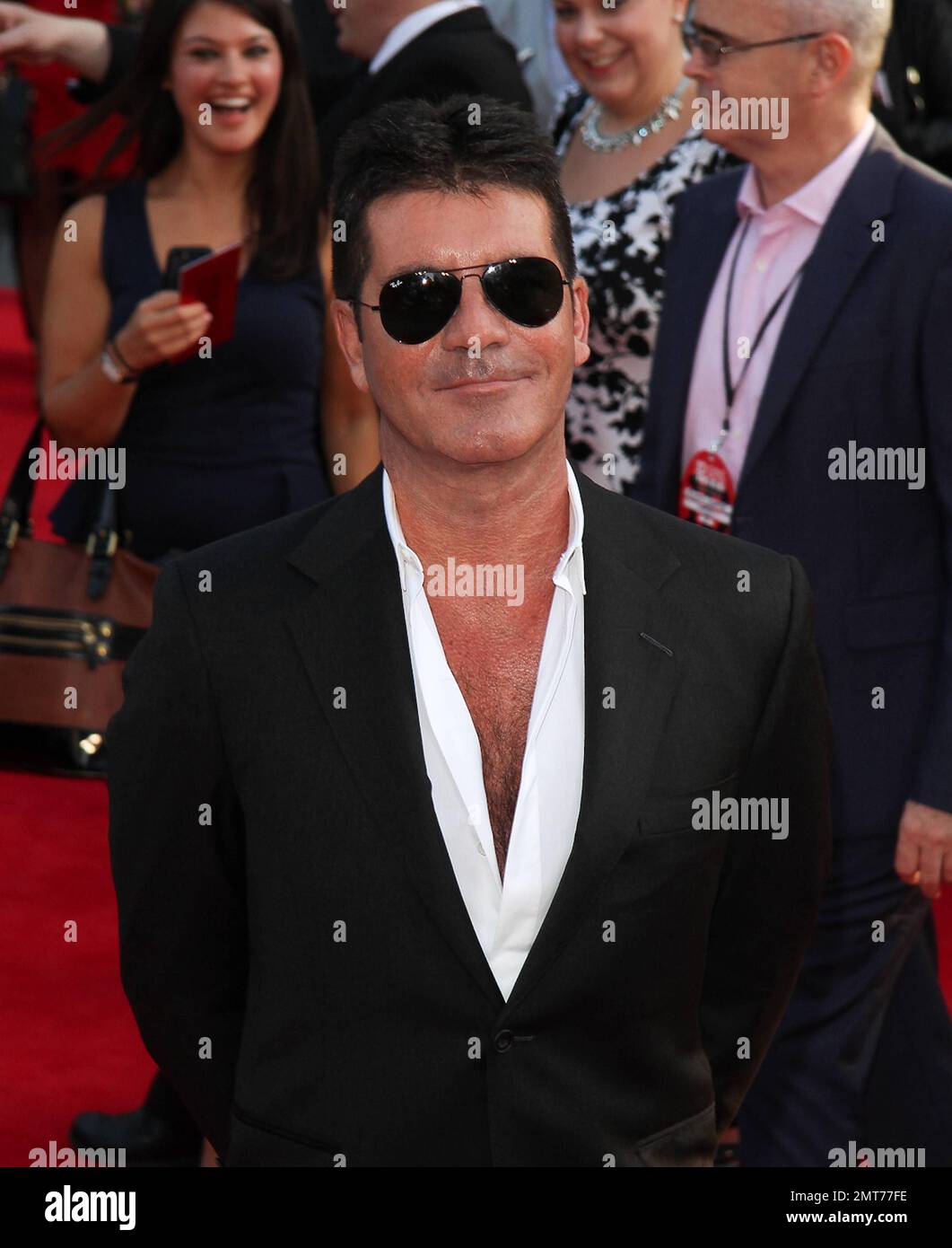 Simon Cowell at the World Premiere of "One Direction: This is Us" in ...