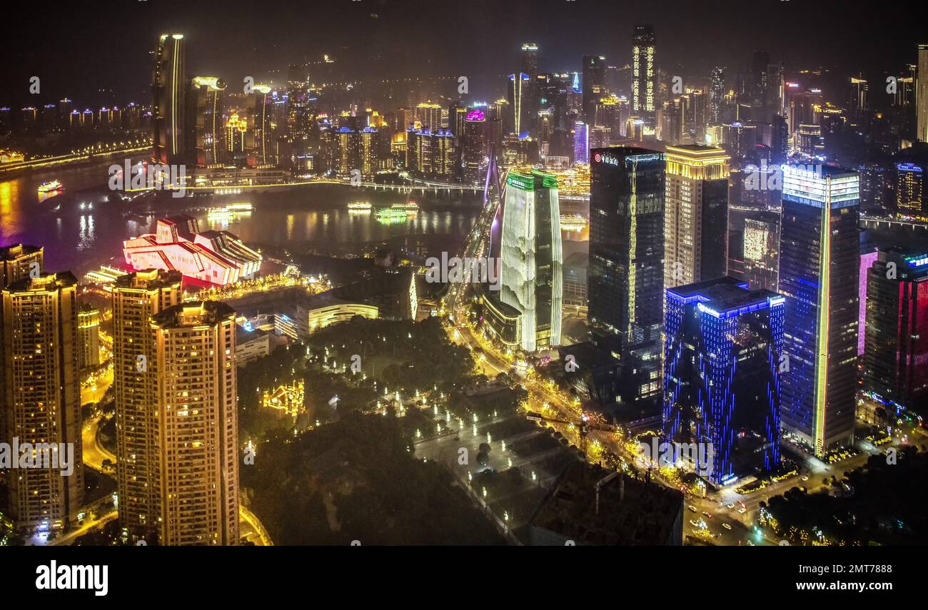 Aerial photo shows the night view along the river in Chongqing, China ...