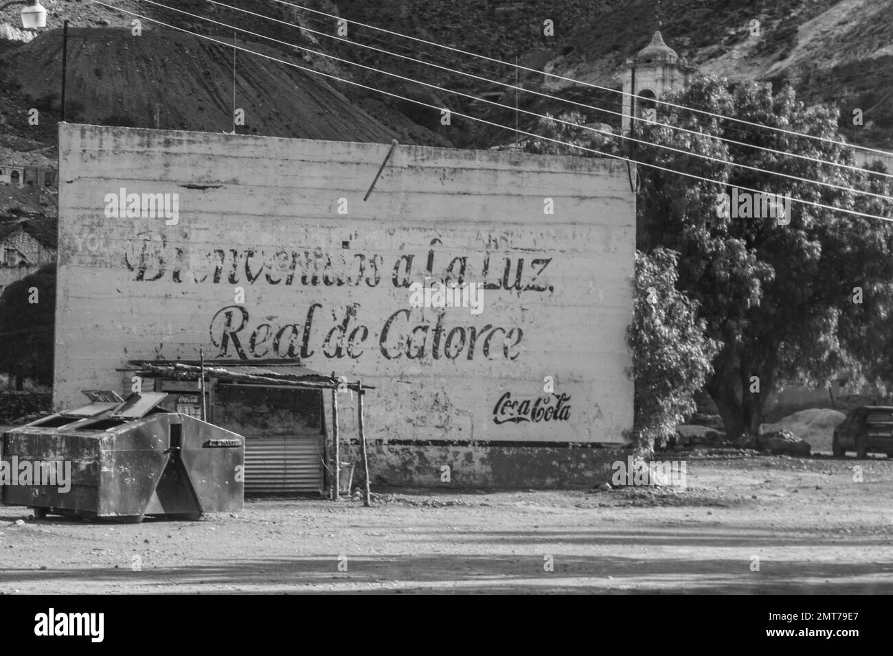 A grayscale shot of a signboard with Real de Catorce village name. San ...