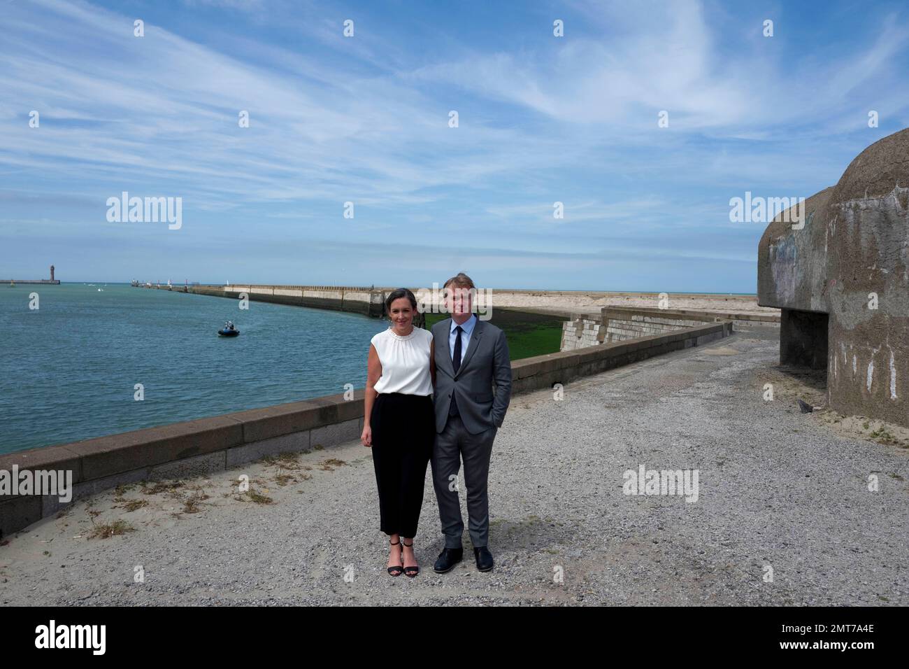 Emma Thomas, left, and Christopher Nolan pose for photographers upon ...