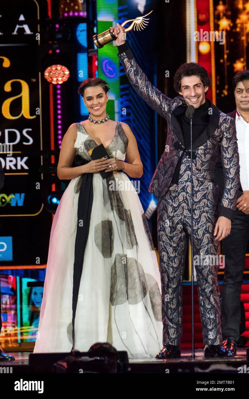 Jim Sarbh accepts an award alongside Neha Dhupia at the 2017 ...