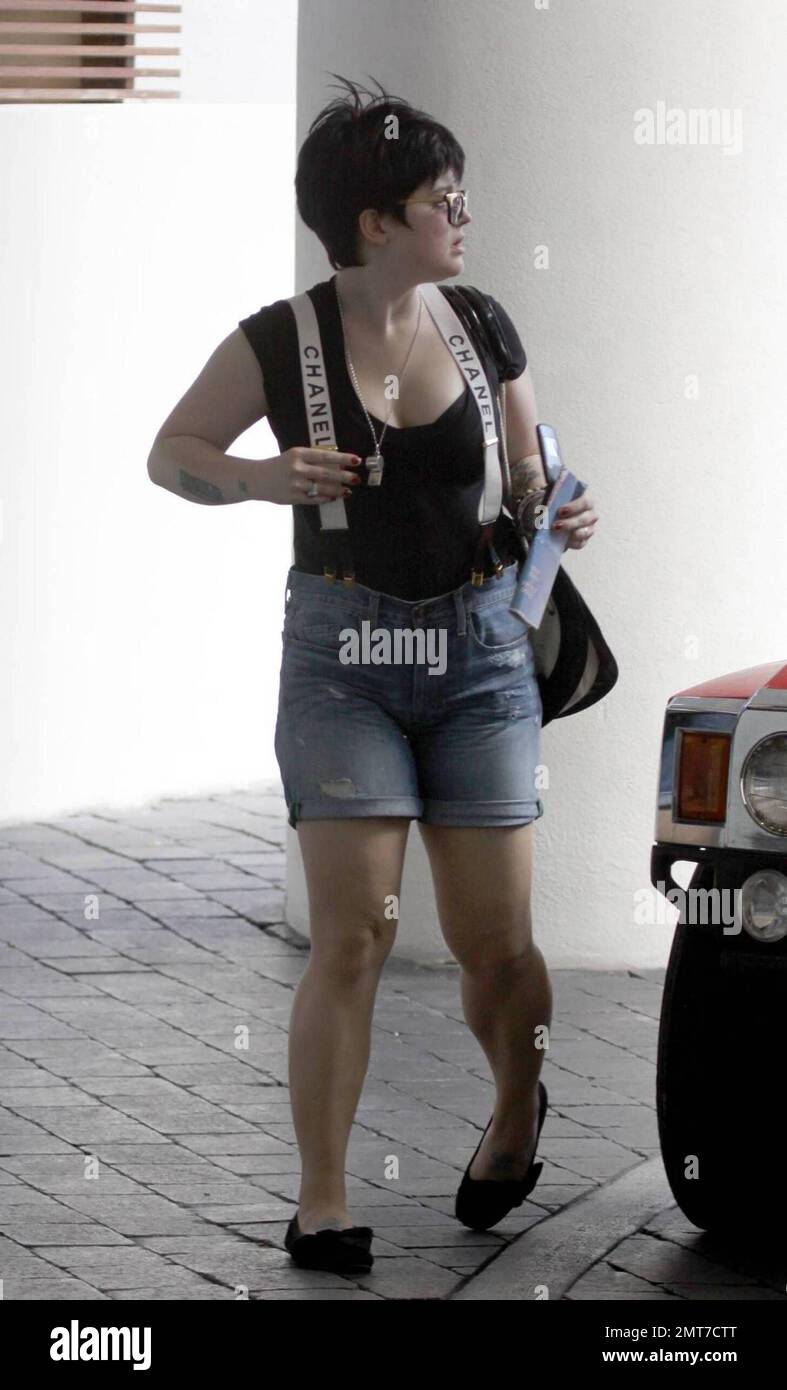 Blue denim mini shorts hi-res stock photography and images - Alamy
