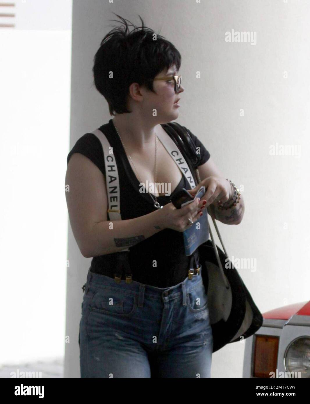 Kelly Osbourne and Luke Worrell take a ride in a mini jeep. Luke drove ...