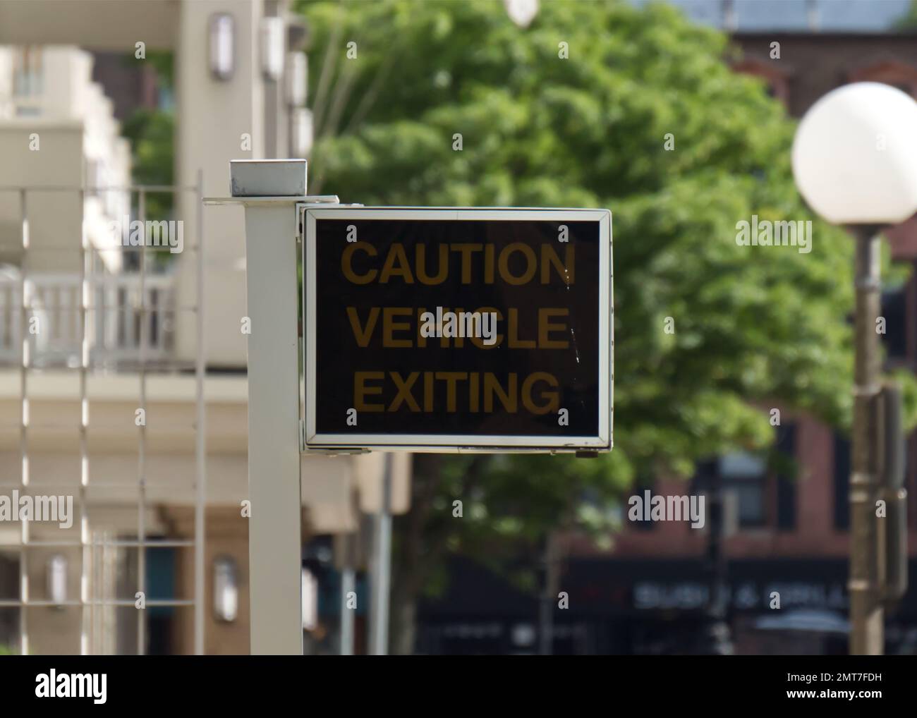 Caution vehicles exiting hi-res stock photography and images - Alamy
