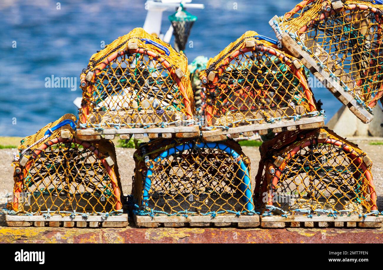 some stacked up fishing traps Stock Photo - Alamy