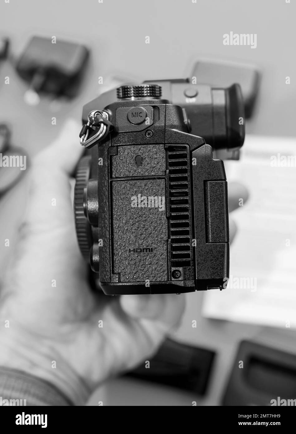 Paris, France - Nov 20, 2022: Hand holding covered HDMI connection ...