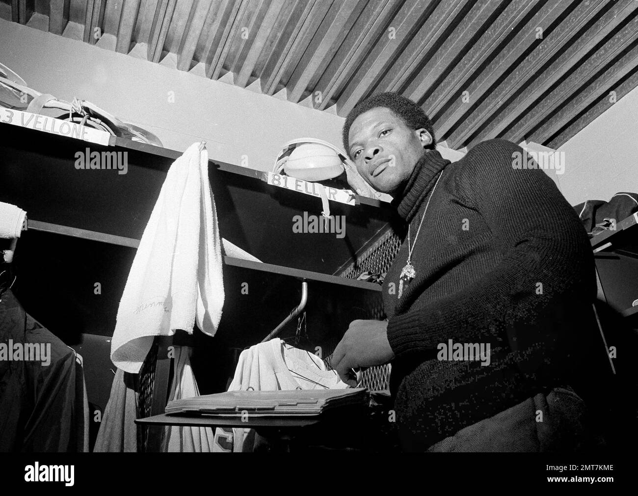 Carl Eller of the NFL's Minnesota Vikings looks down at a visitor to ...