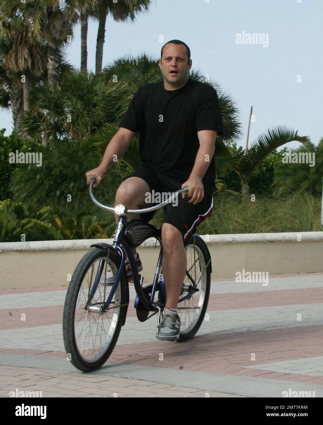 Exclusive!! Owen Wilson and Vince Vaughn take a Sunday afternoon bike ride along the Miami Beach ...