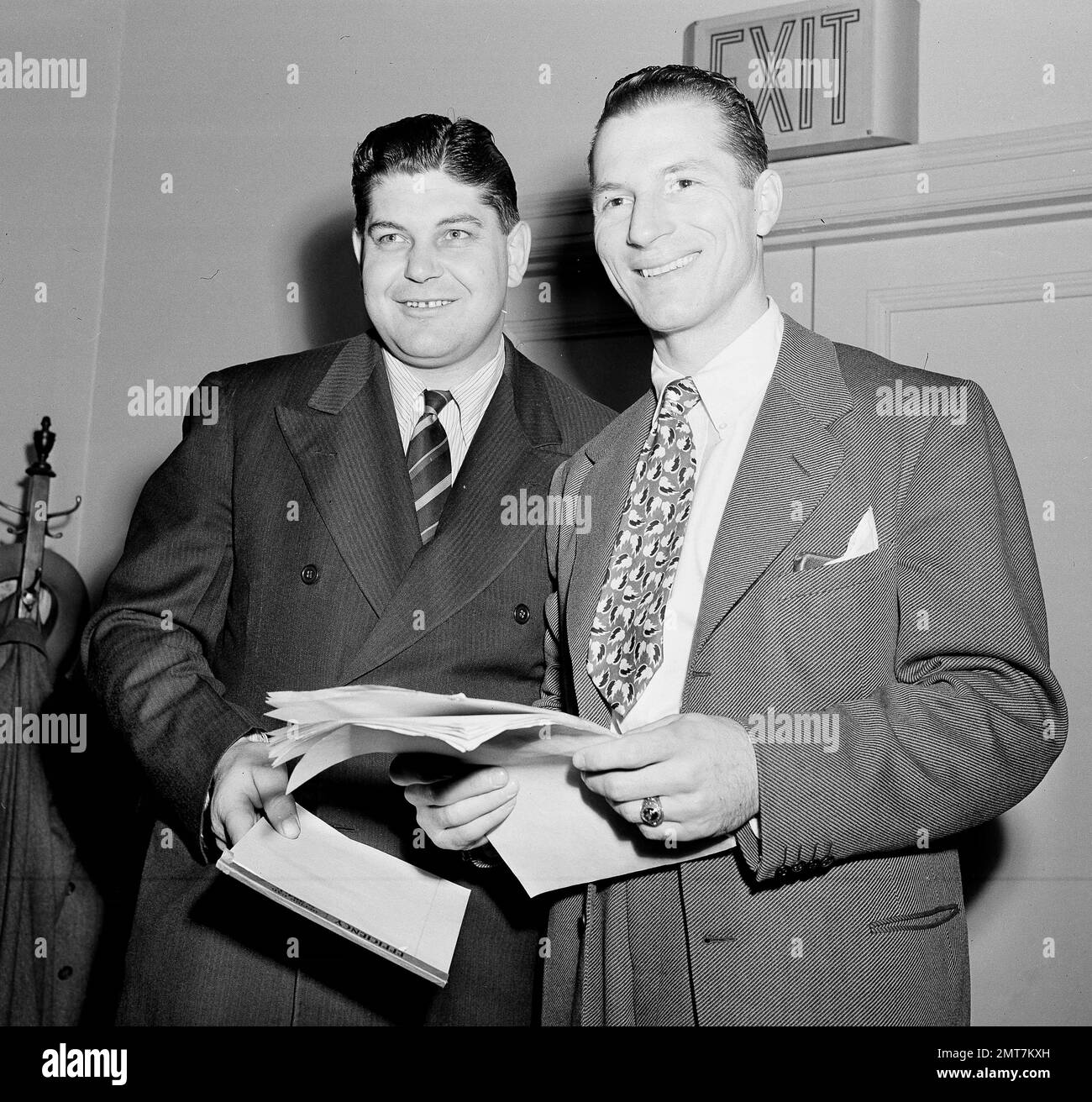 Two former pro football players famous for carrying the ball now carry ...