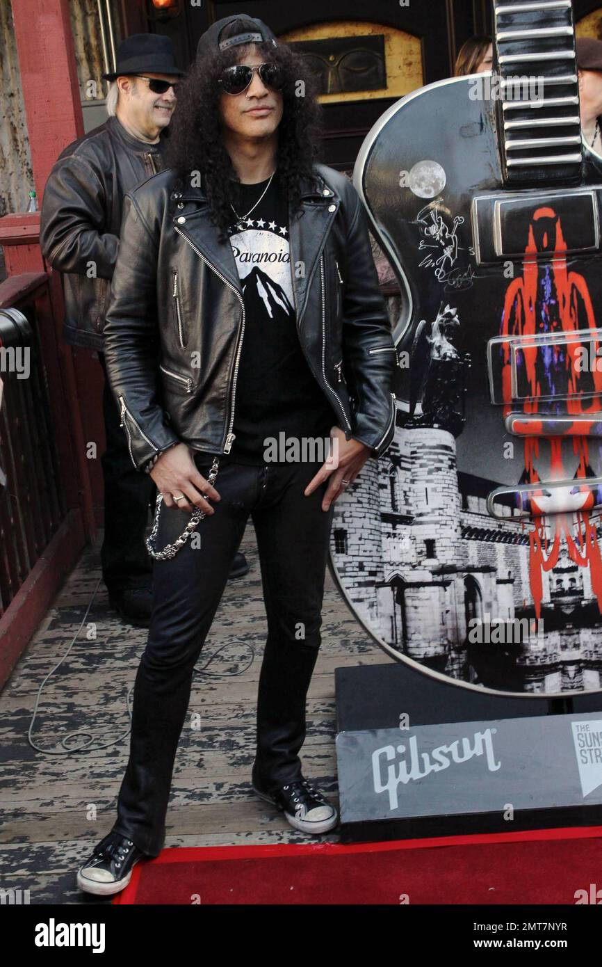 Rock legend Ozzy Osbourne is joined by rocker Slash as he appears at ...