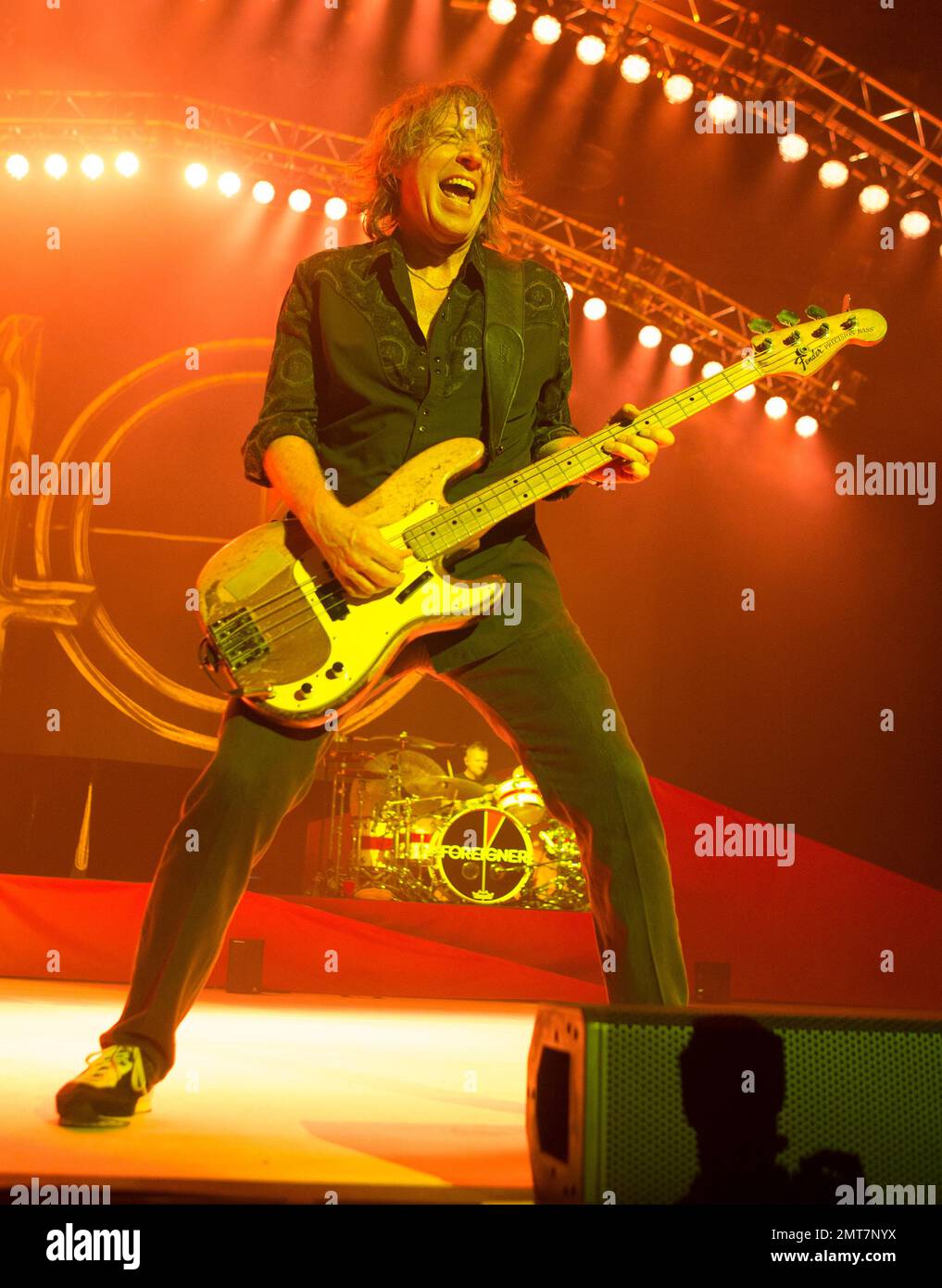 Jeff Pilson of the band Foreigner performs in concert during their ...