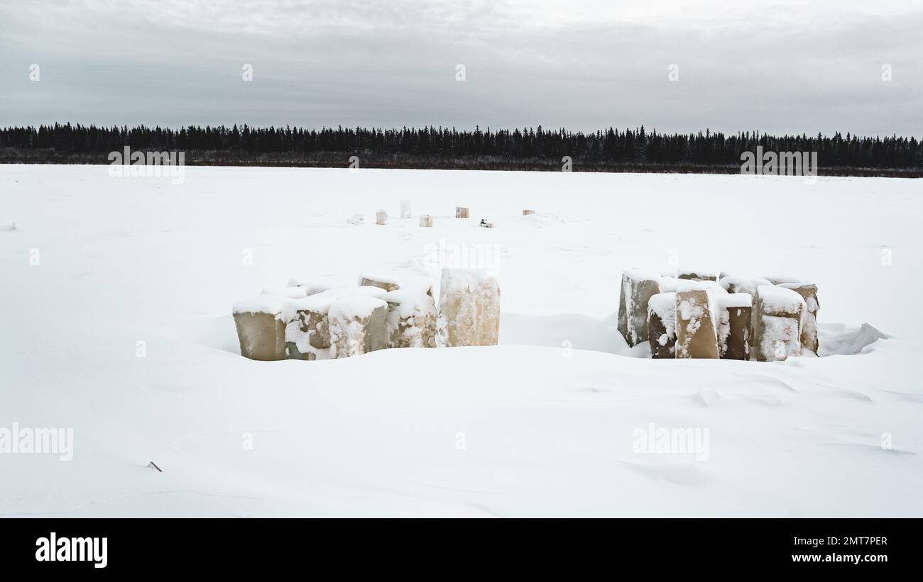 Pillars of carved ice are covered with snow on the Vilyui River in ...