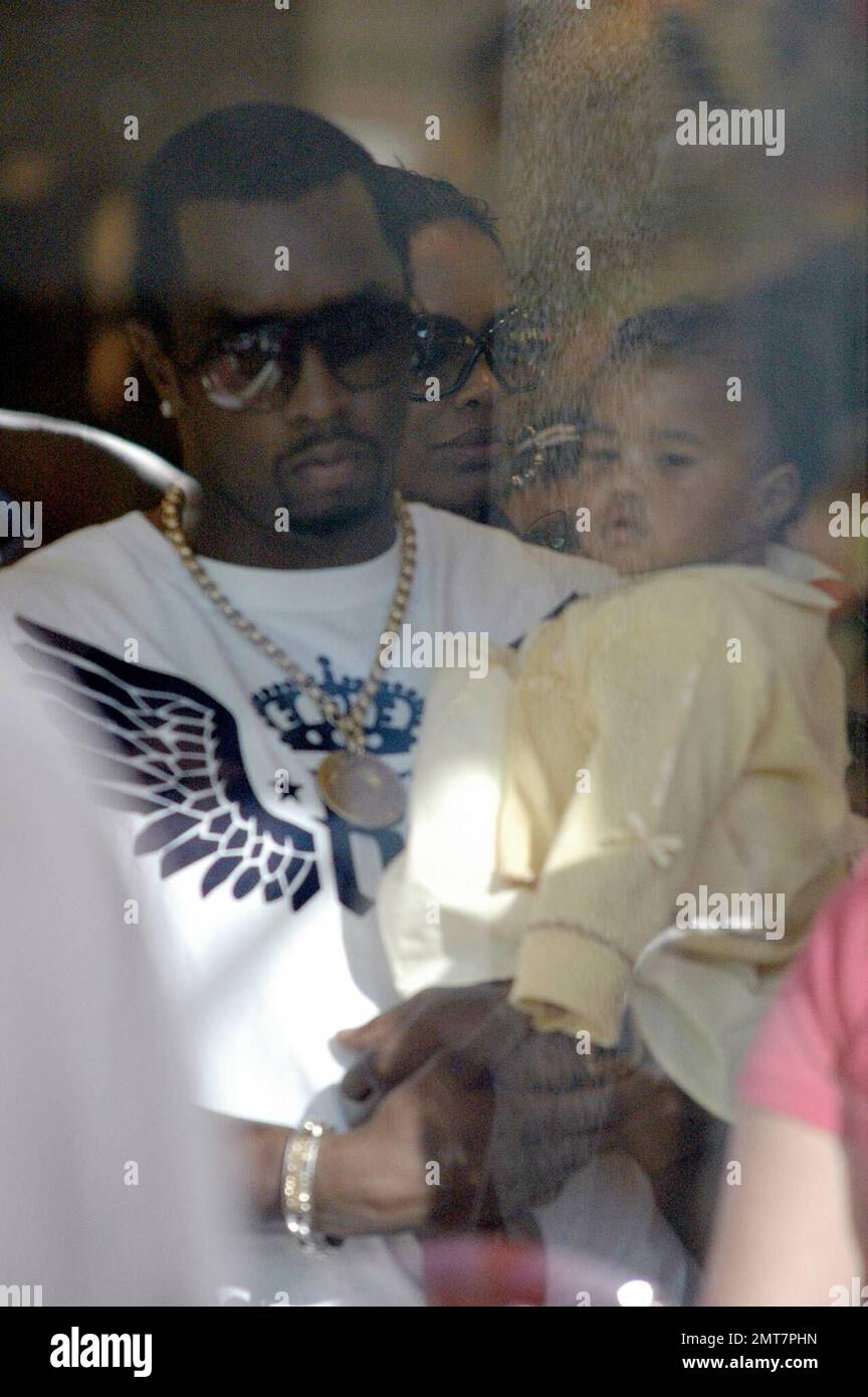 Just call him P Daddy! P Diddy totes his twin daughters D'Lilah Star ...