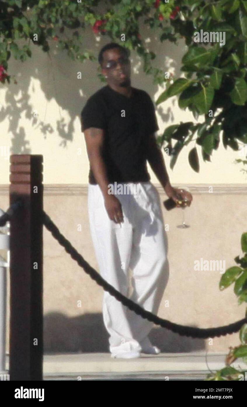 EXCLUSIVE!! Hip Hop mogul Sean P Diddy Combs enjoys a glass of wine and ...