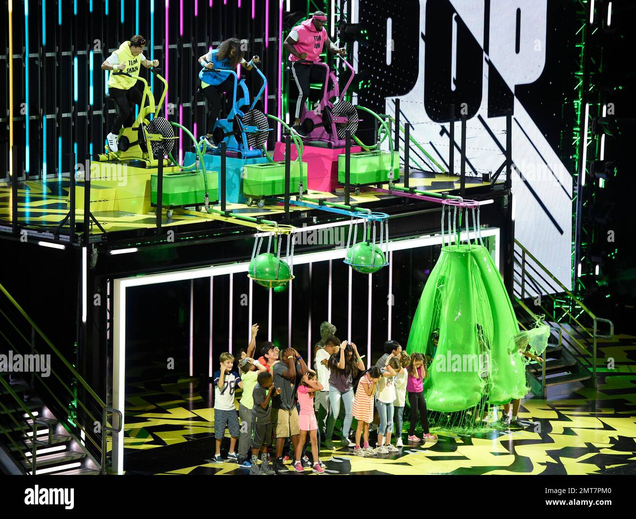 Shaun White, from left, Skylar Diggins-Smith and Von Miller dump slime ...