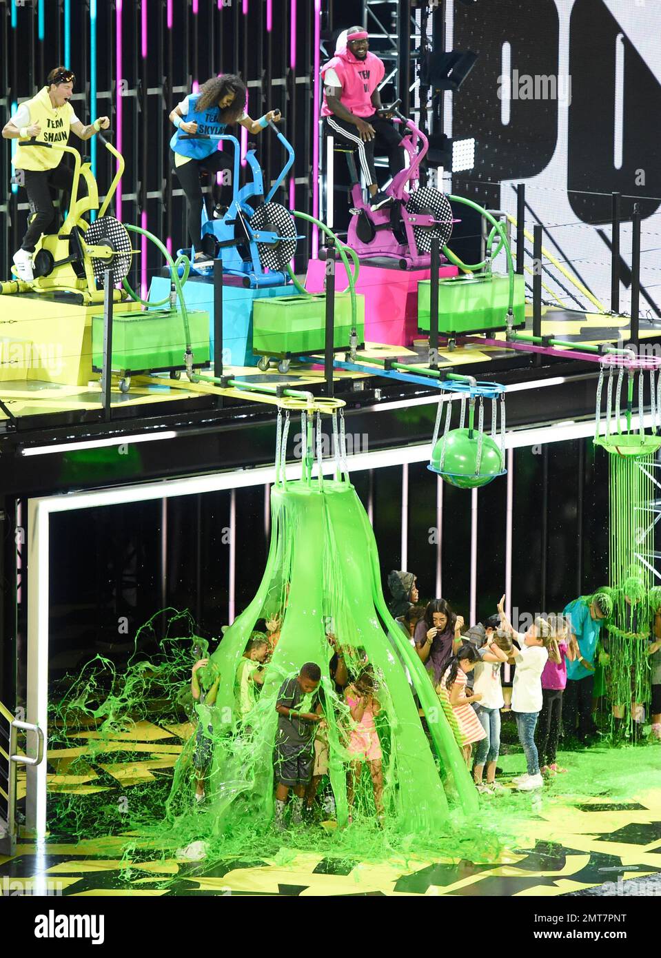 Shaun White, from left, Skylar Diggins-Smith and Von Miller dump slime ...