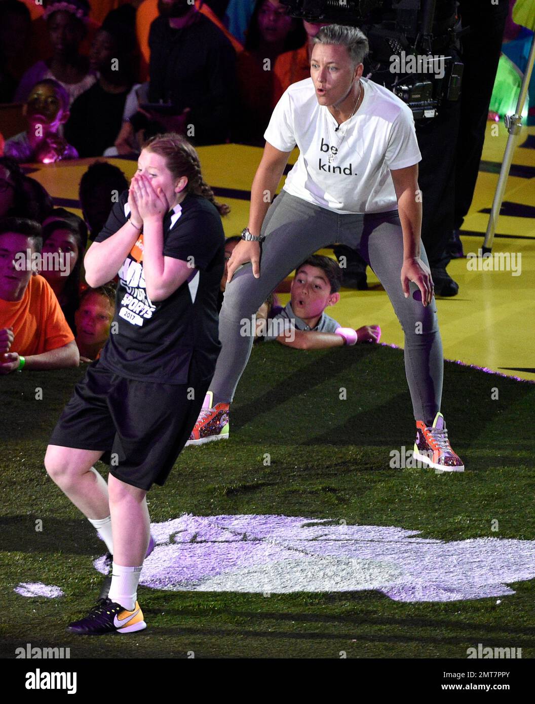 Abby Wambach, right, and Evelyn Grace Briggs participate is a $50,000 ...