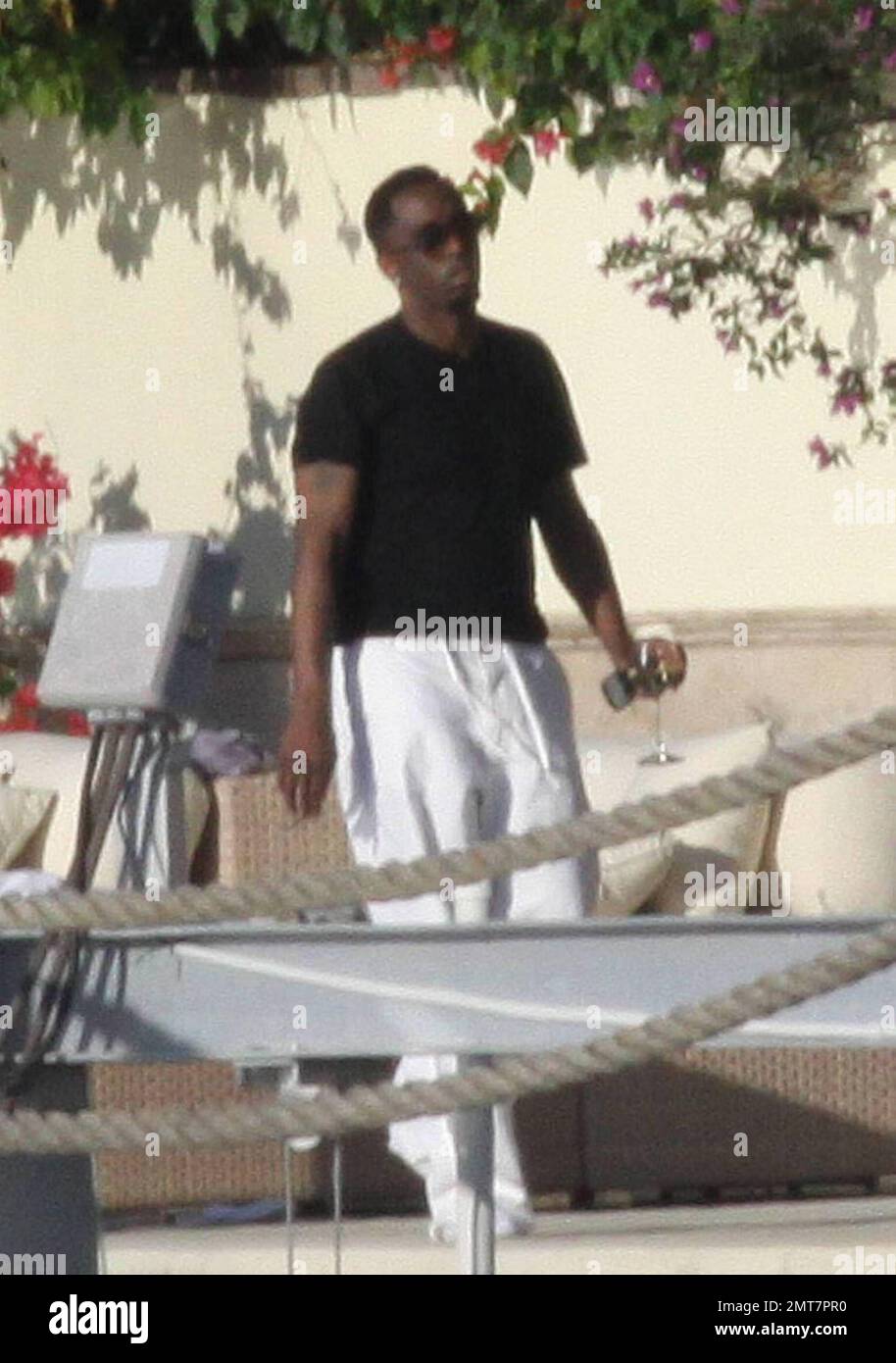 - EXCLUSIVE!! Hip Hop mogul Sean P Diddy Combs enjoys a glass of wine ...
