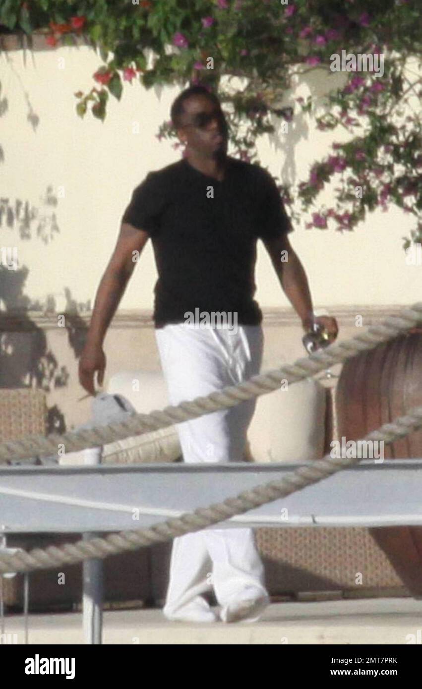- EXCLUSIVE!! Hip Hop mogul Sean P Diddy Combs enjoys a glass of wine ...