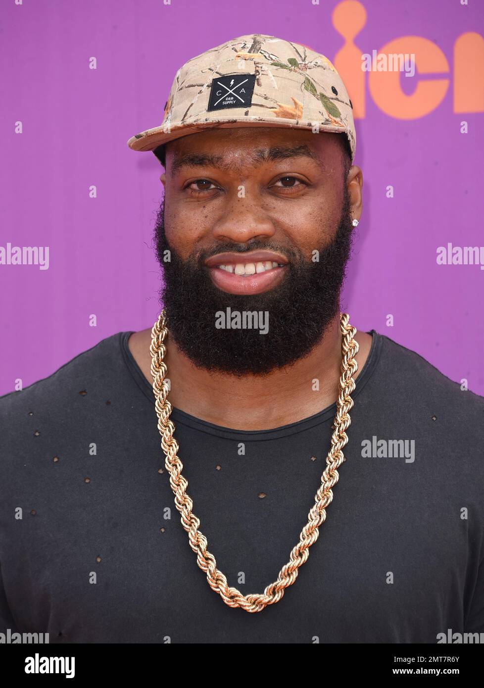 Former NFL football player Chris Vincent arrives at the Kids' Choice ...