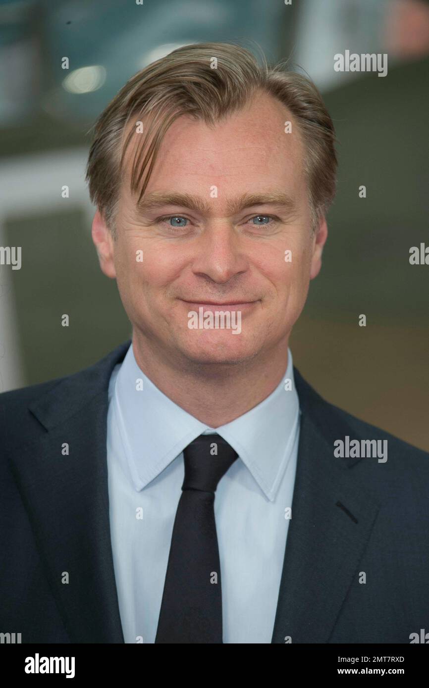 Director Christopher Nolan poses for photographers upon arrival at the ...