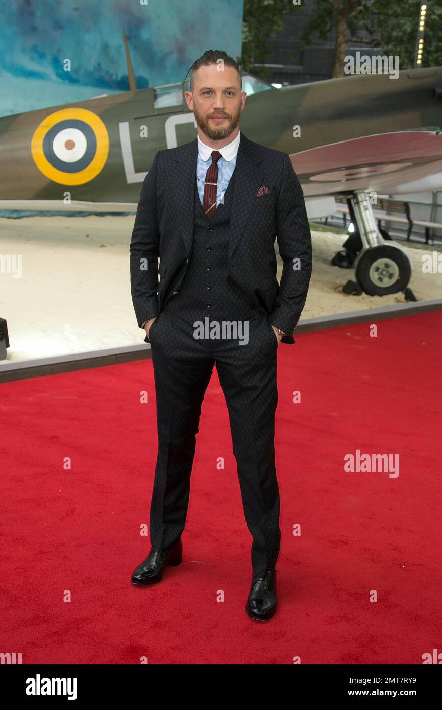 Actor Tom Hard poses for photographers upon arrival at the World ...