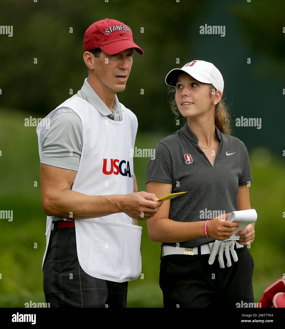 Rachel Heck talks with her father and caddie, Robert Heck, before ...