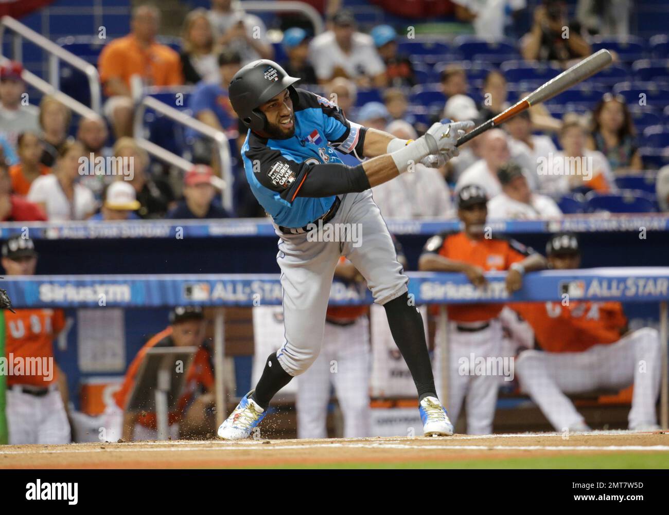 New York Mets and the World Team's Amed Rosario bats during the first inning of the All-Star ...