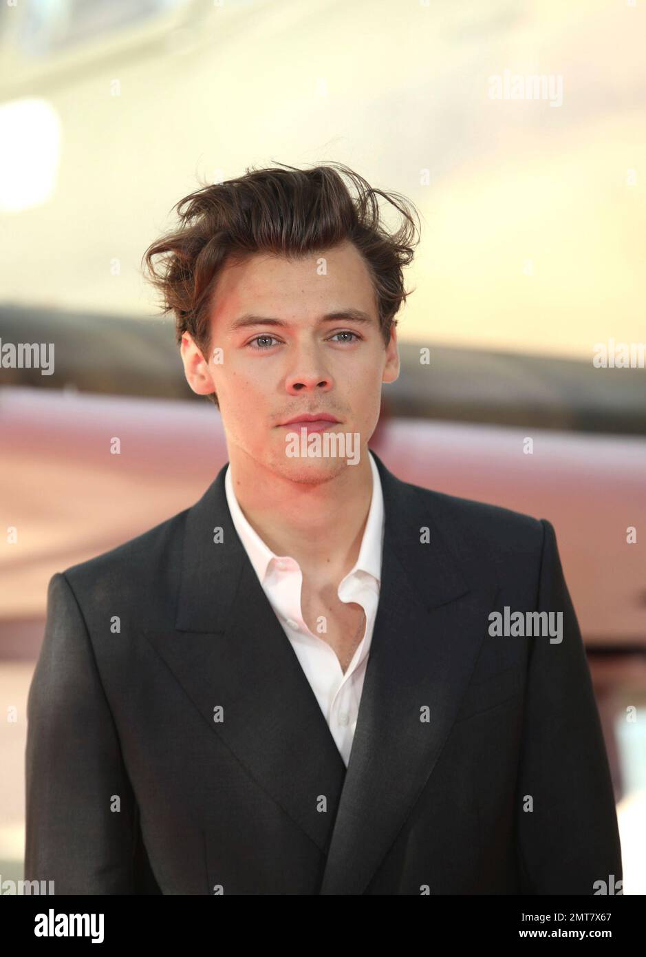 Actor Harry Styles poses for photographers upon arrival at the World ...