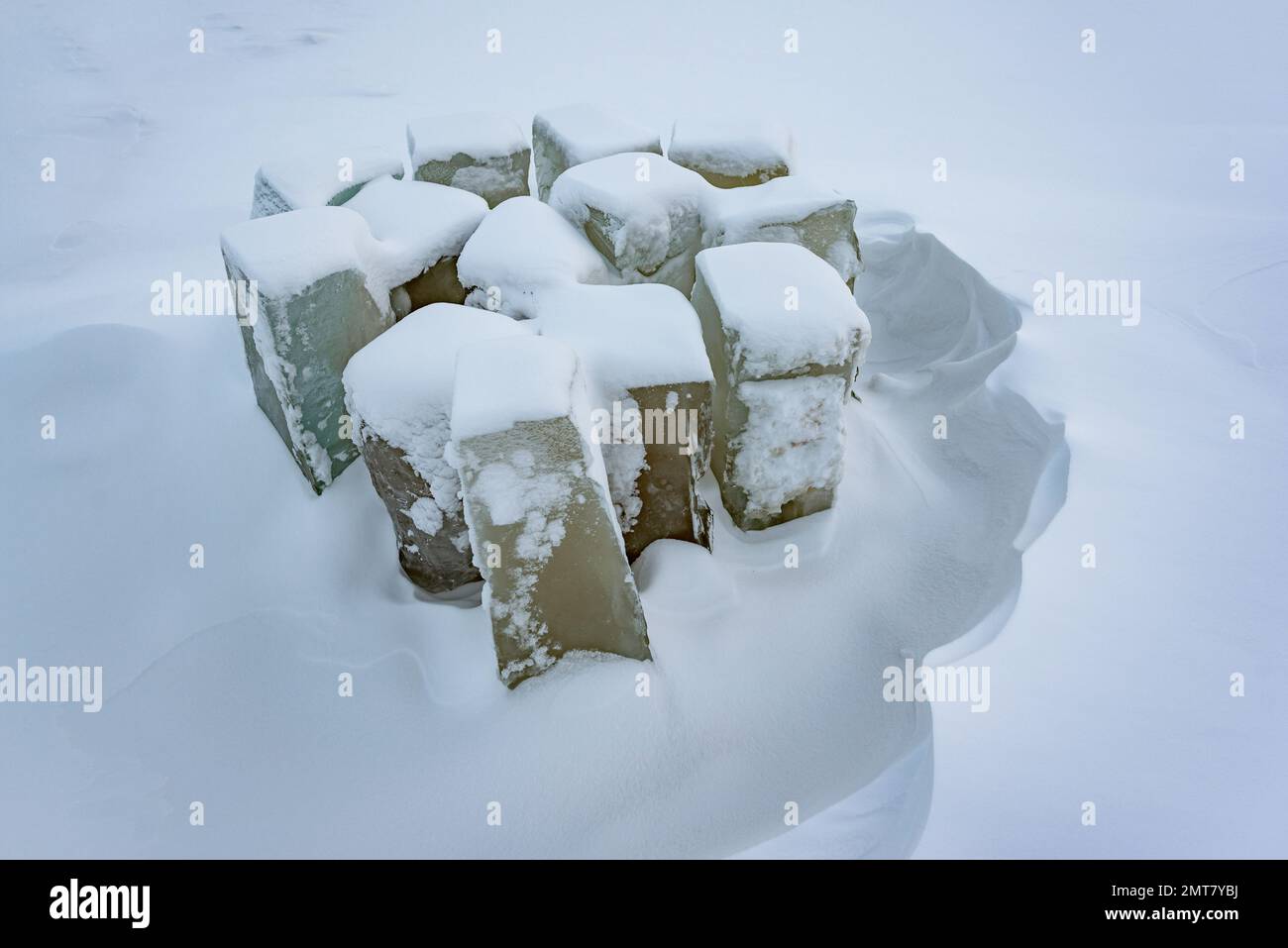 Heaps of pillars of ice for defrosting and eating stands covered with ...