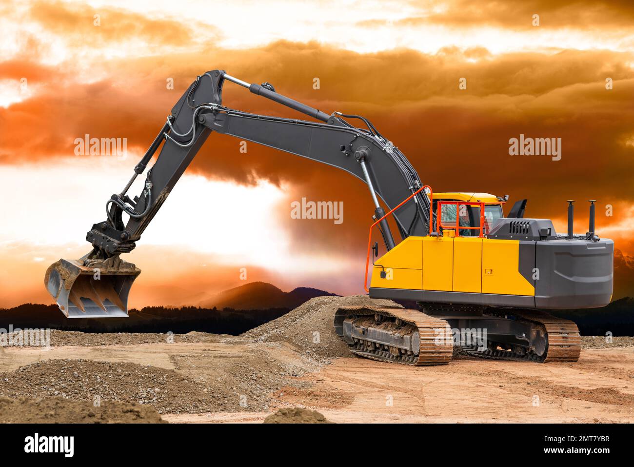 excavator is working and digging at construction site Stock Photo - Alamy