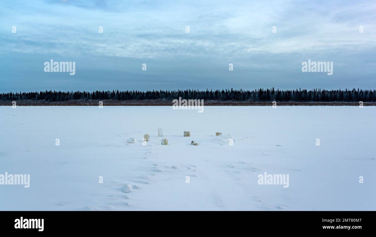 Heaps of columns of ice for defrosting and eating stands covered with ...