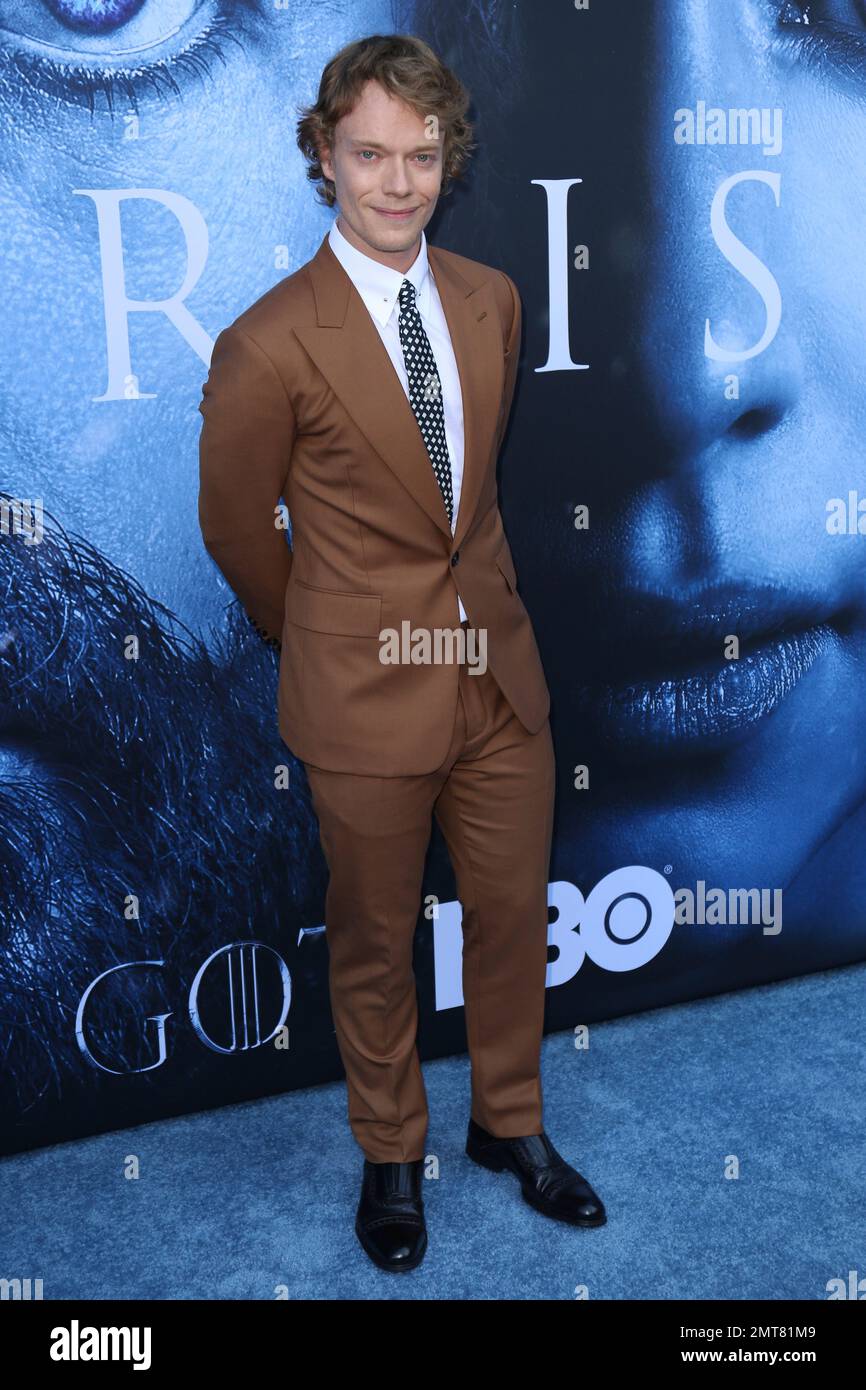 Alfie Allen arrives at the LA Premiere of "Game of Thrones" at The Walt ...