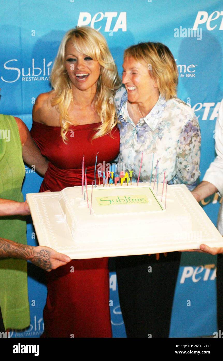 Pamela Anderson blows out the candles for her 40th with PETA president ...