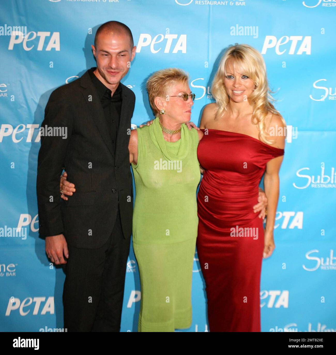 Pamela Anderson blows out the candles for her 40th with PETA president ...