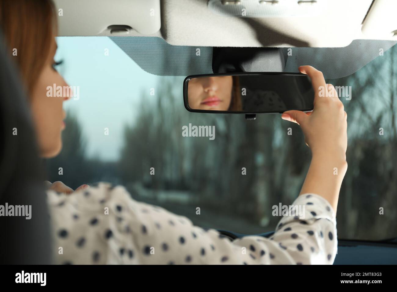 Adjusting the rear view mirror hi-res stock photography and images - Alamy