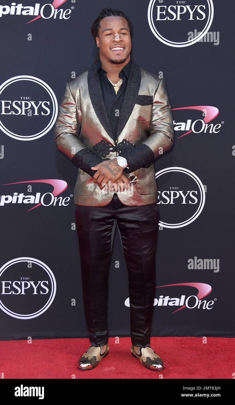 NFL football player Devonta Freeman, of the Atlanta Falcons, arrives at ...