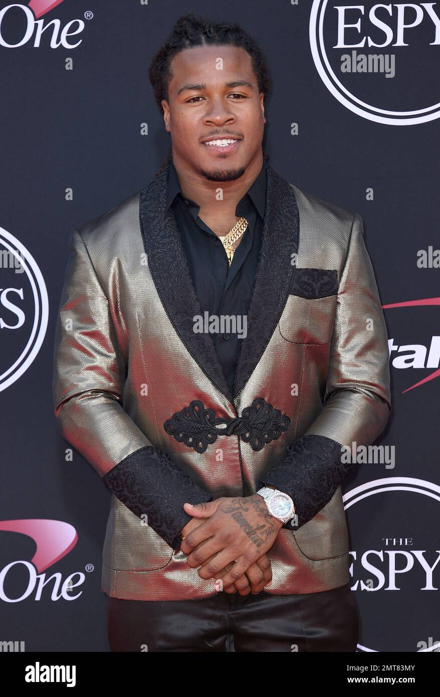 NFL football player Devonta Freeman, of the Atlanta Falcons, arrives at ...