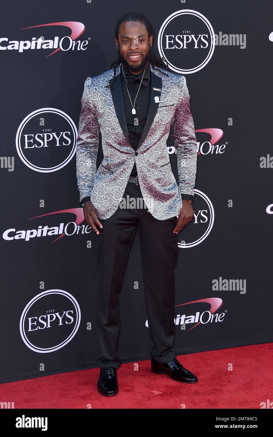 NFL football player Richard Sherman, of the Seattle Seahawks, arrives ...