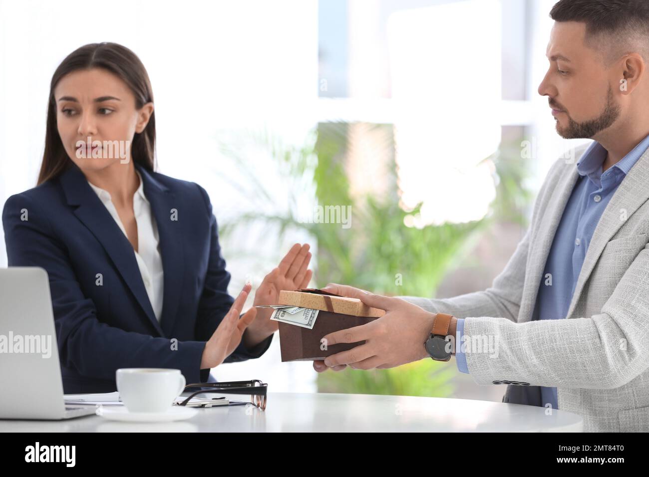 Refusing woman office hi-res stock photography and images - Alamy