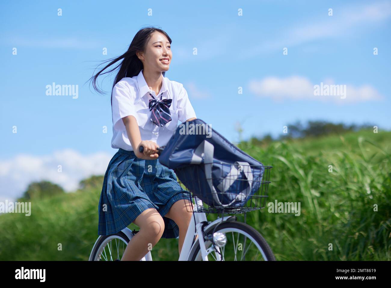 Japanese high school student on a bike outdoors Stock Photo - Alamy