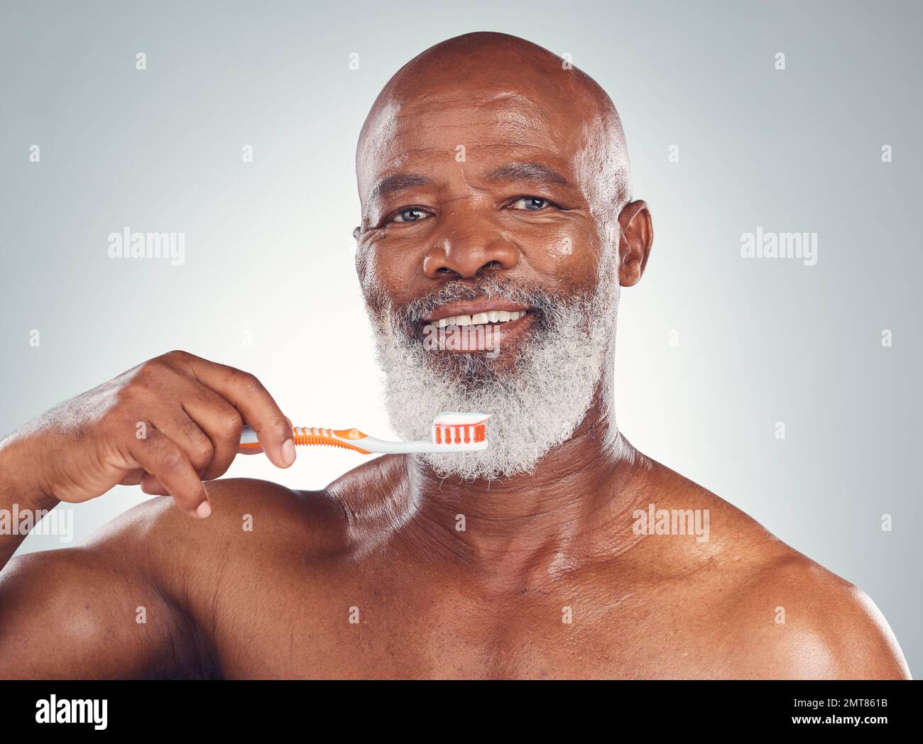 Dental care portrait, senior man and morning toothbrush for oral hygiene in studio for wellness ...