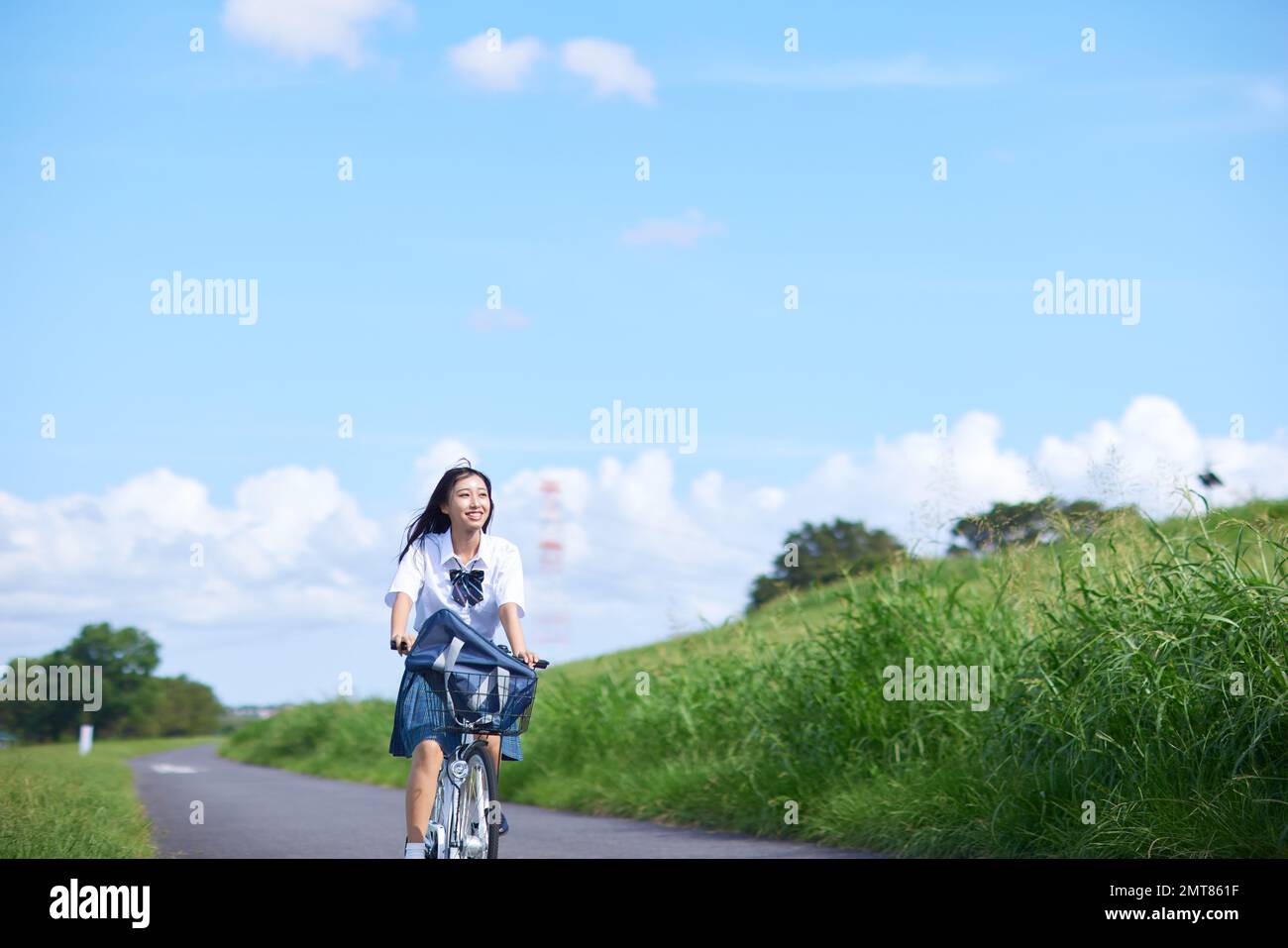 Japanese high school student on a bike outdoors Stock Photo - Alamy
